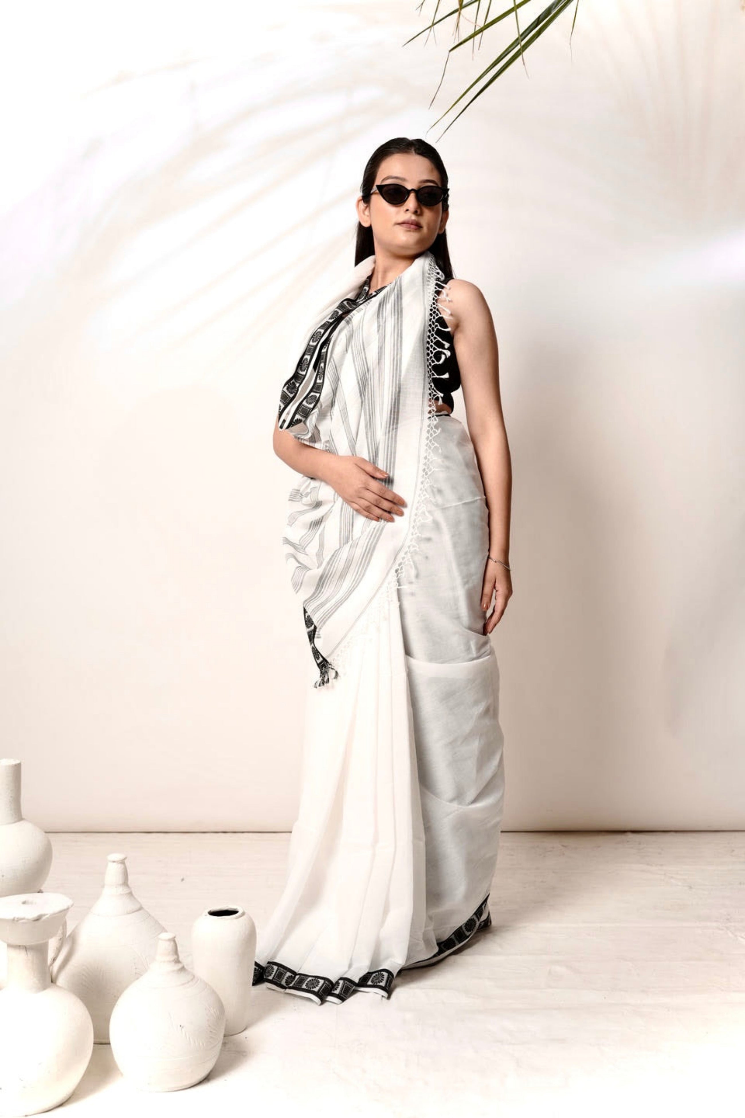 Ethereal I White cotton handloom saree with twill border